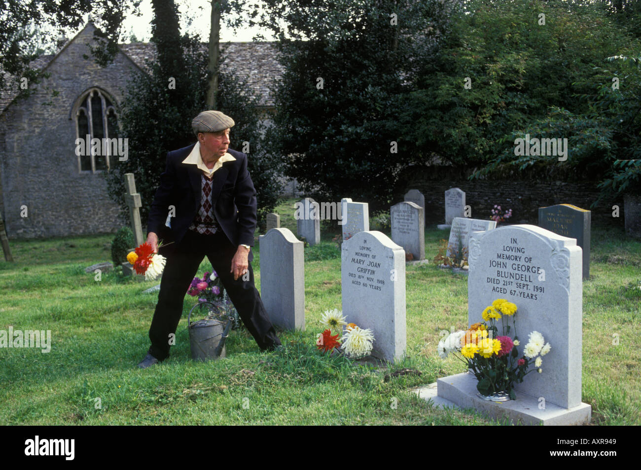 Cemetery with man at grave hi-res stock photography and images - Alamy