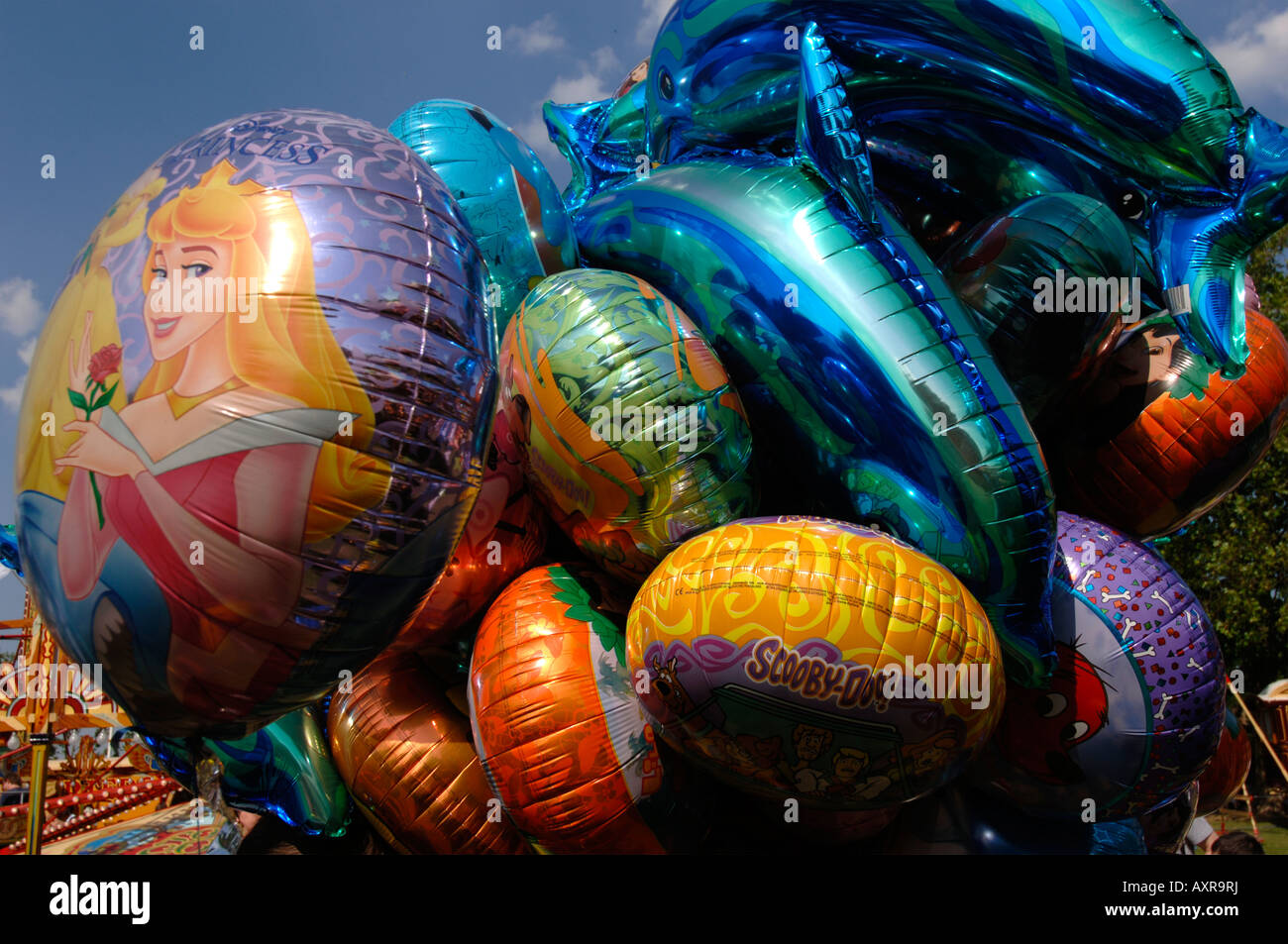 Balloons on sale at a fairground Stock Photo - Alamy