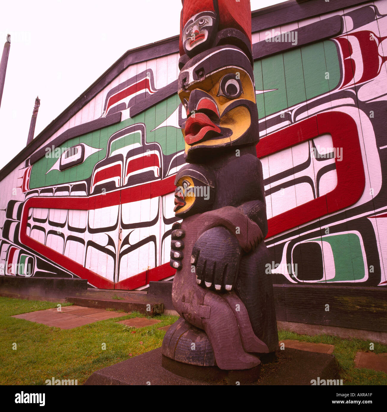 Kwakwaka'wakw (Kwakiutl) Longhouse and Totem Pole in Thunderbird Park ...