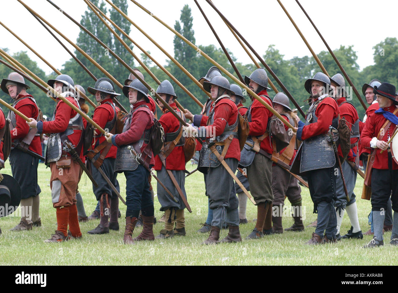 Men with swords and spears reenacts war battle Stock Photo - Alamy