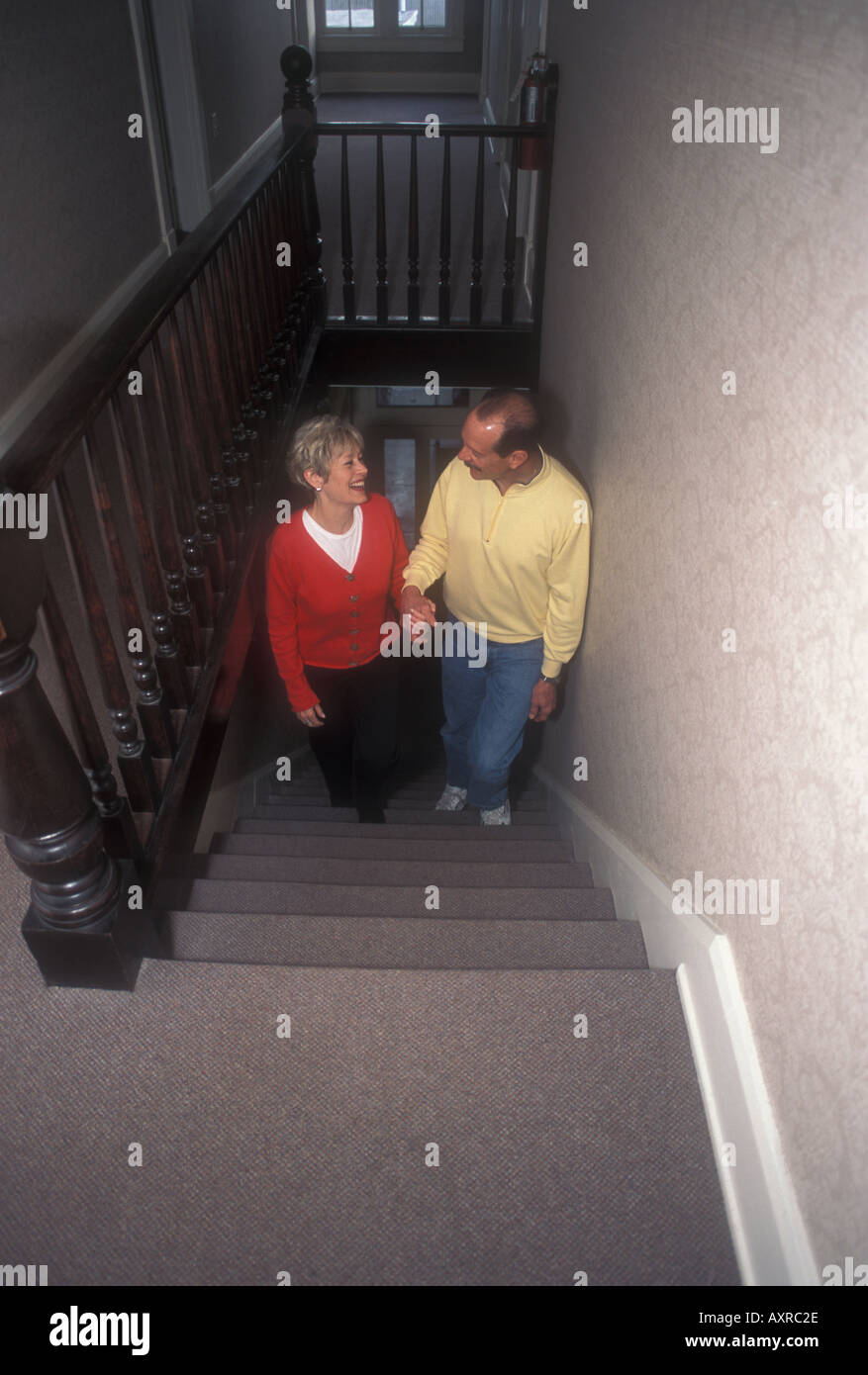 Holding Hands Walking Up Steps Stock Photo - Alamy