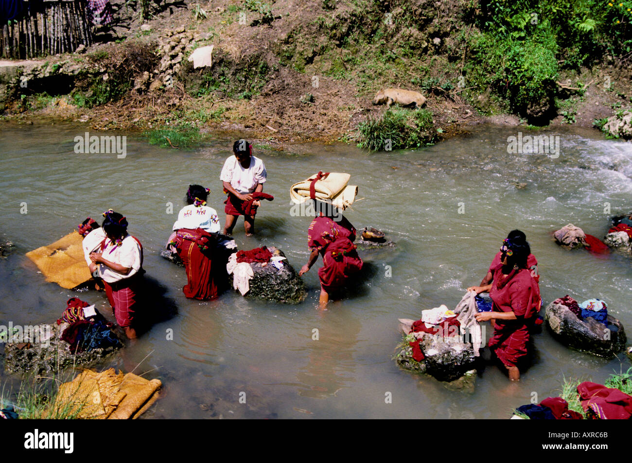 Indians washing clothes in river Chajul Guatemala Stock Photo - Alamy