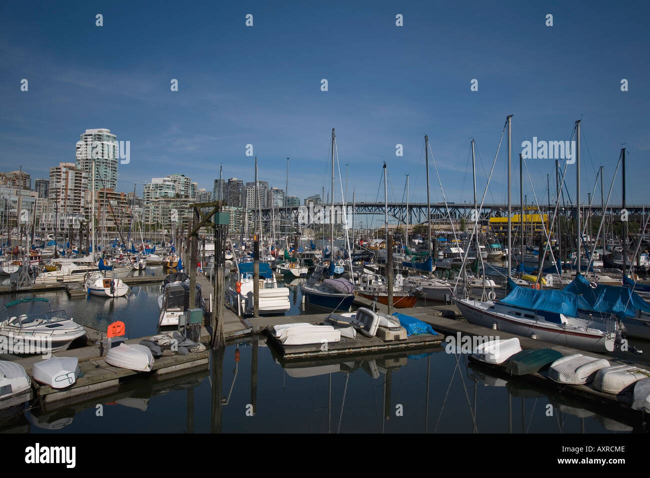 Harbour with cityscape in background Stock Photo - Alamy