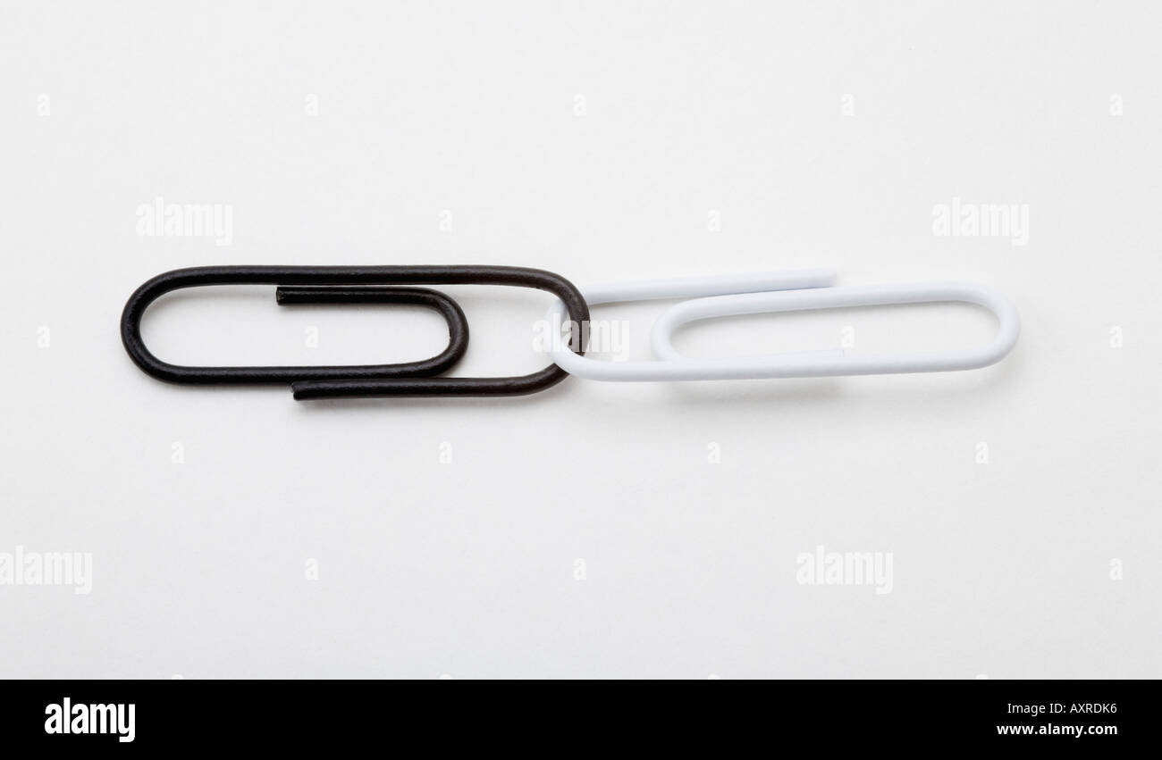 Black and white paper clips joined together Stock Photo - Alamy