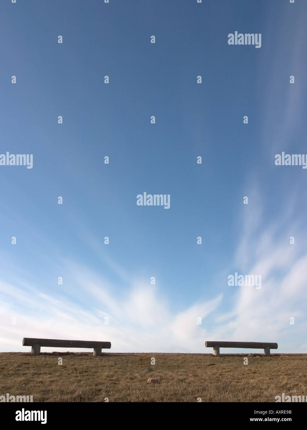 Two empty log benches at the top of a hill , Finland Stock Photo - Alamy