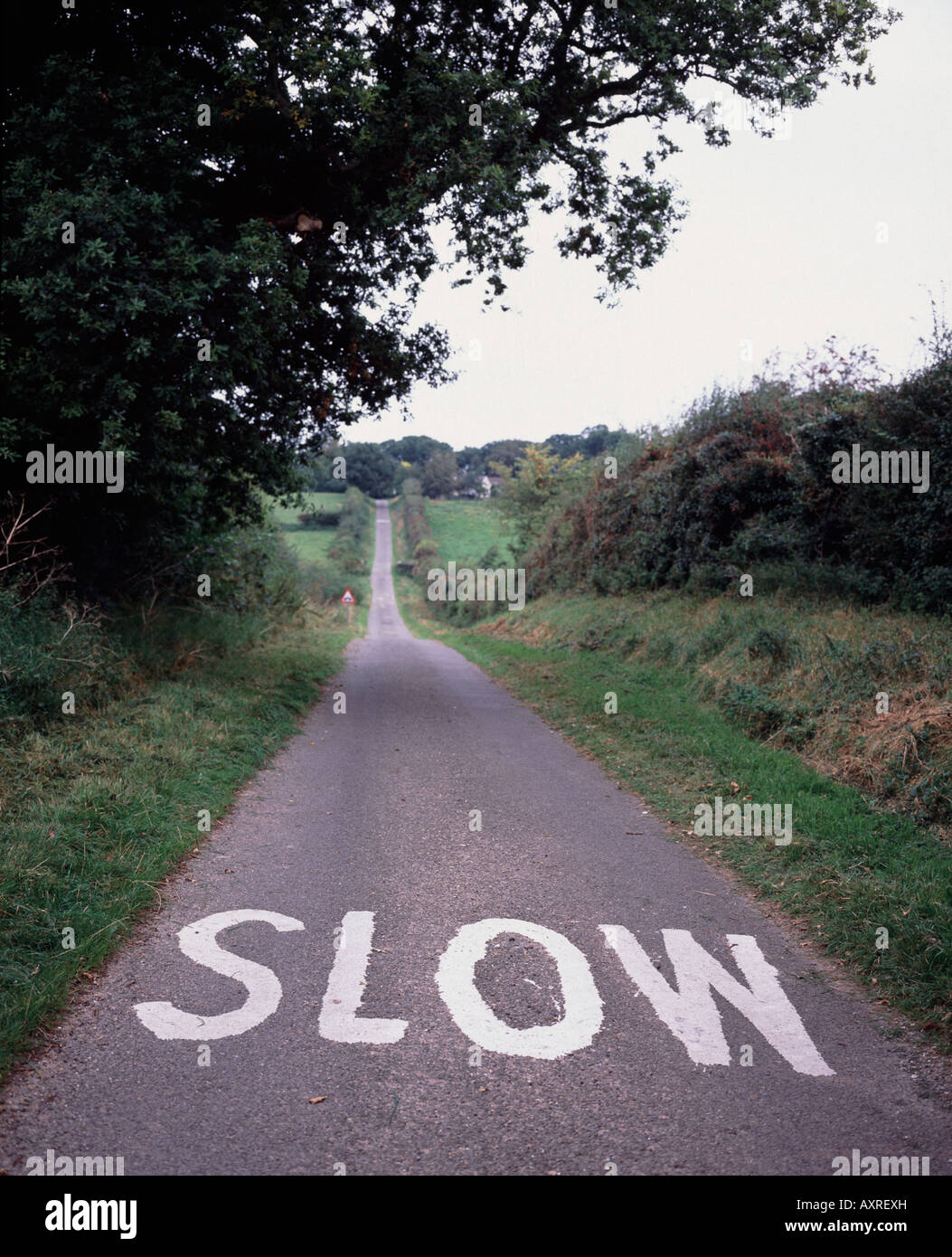 Slow road marking hi-res stock photography and images - Alamy