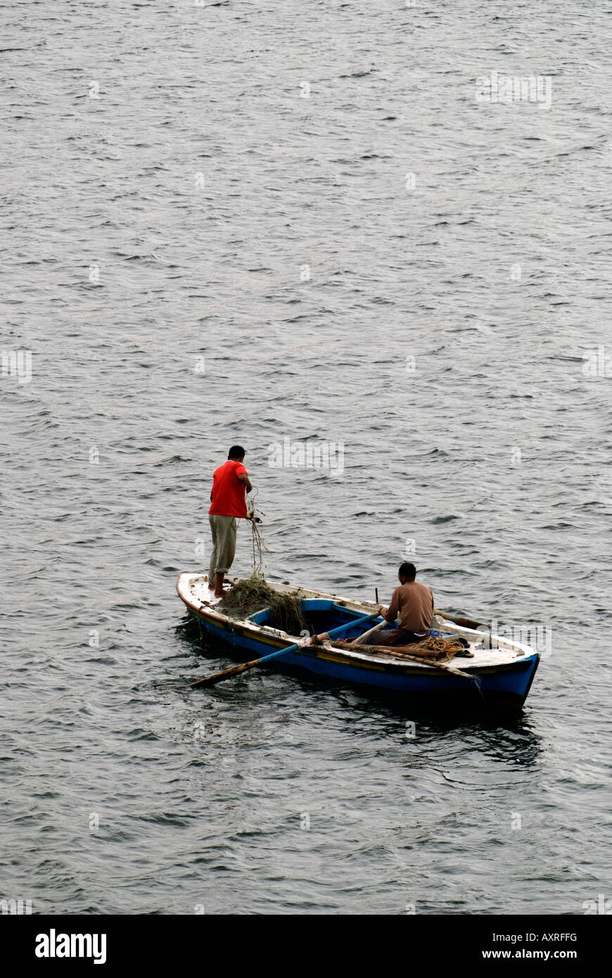 Fishermen in their boats on the Suez Canal Isamailia Egypt Stock Photo ...
