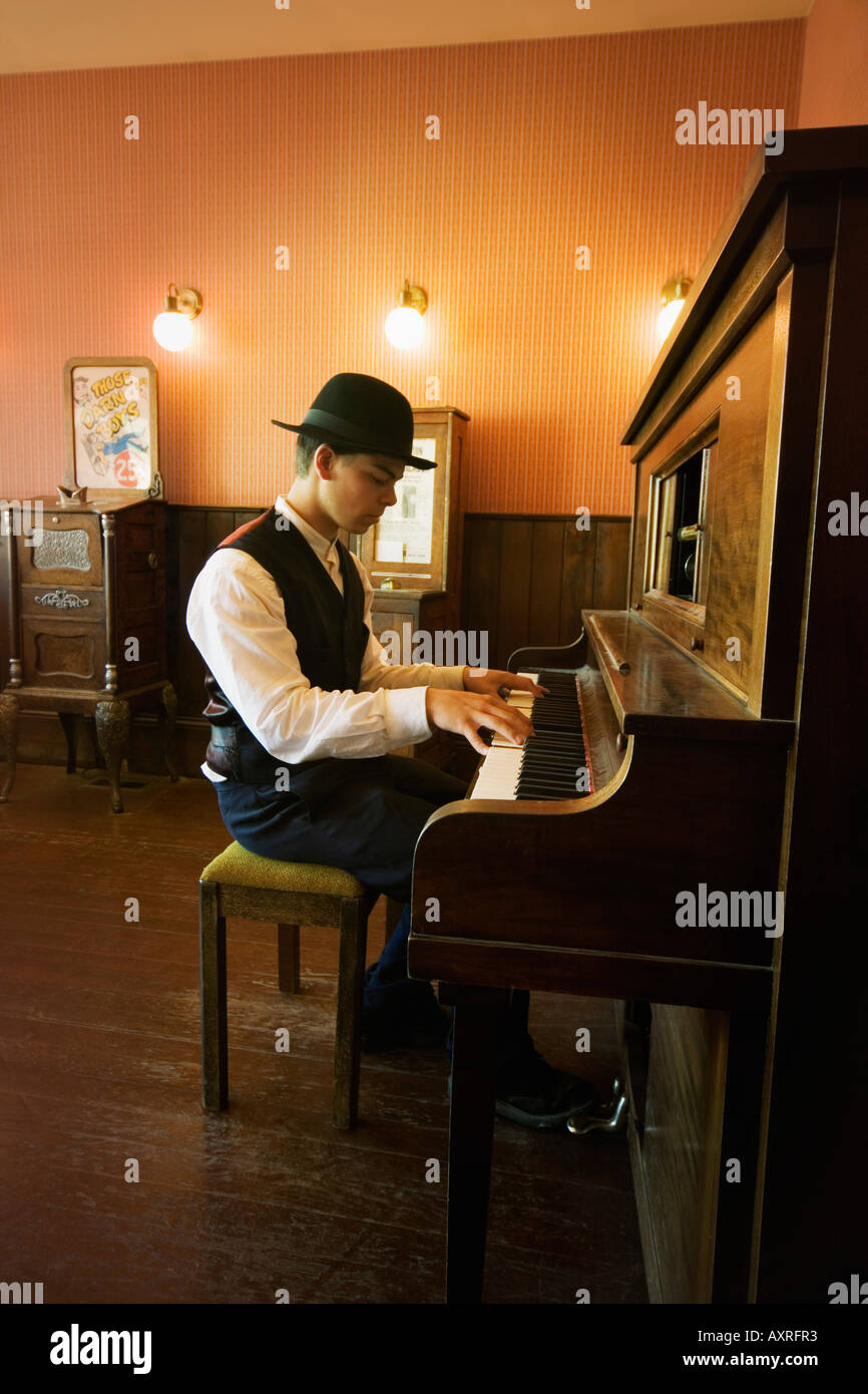 Old man playing piano hi-res stock photography and images - Alamy
