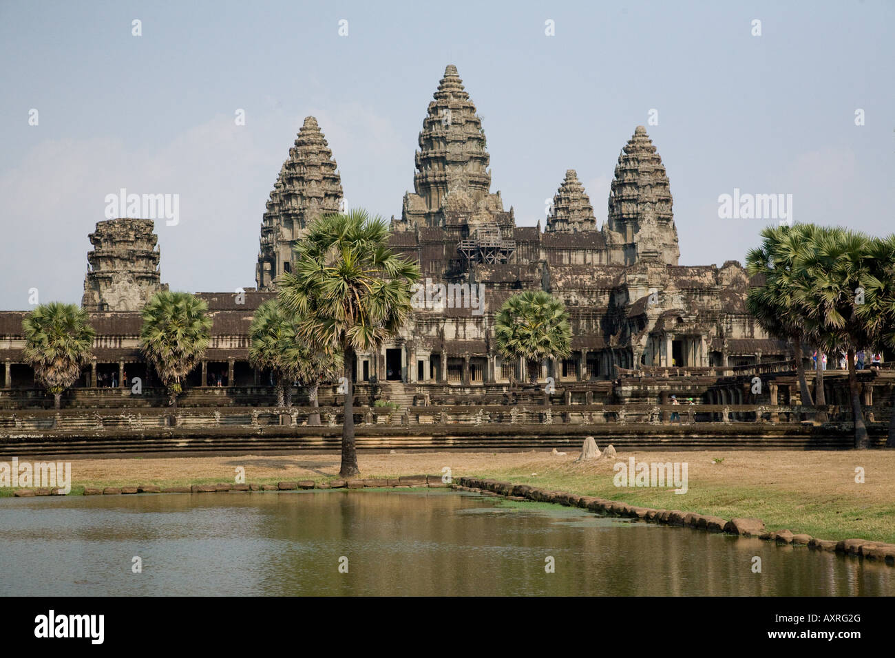 Angkor Wat and reflecting pool in Cambodia during the day Stock Photo ...