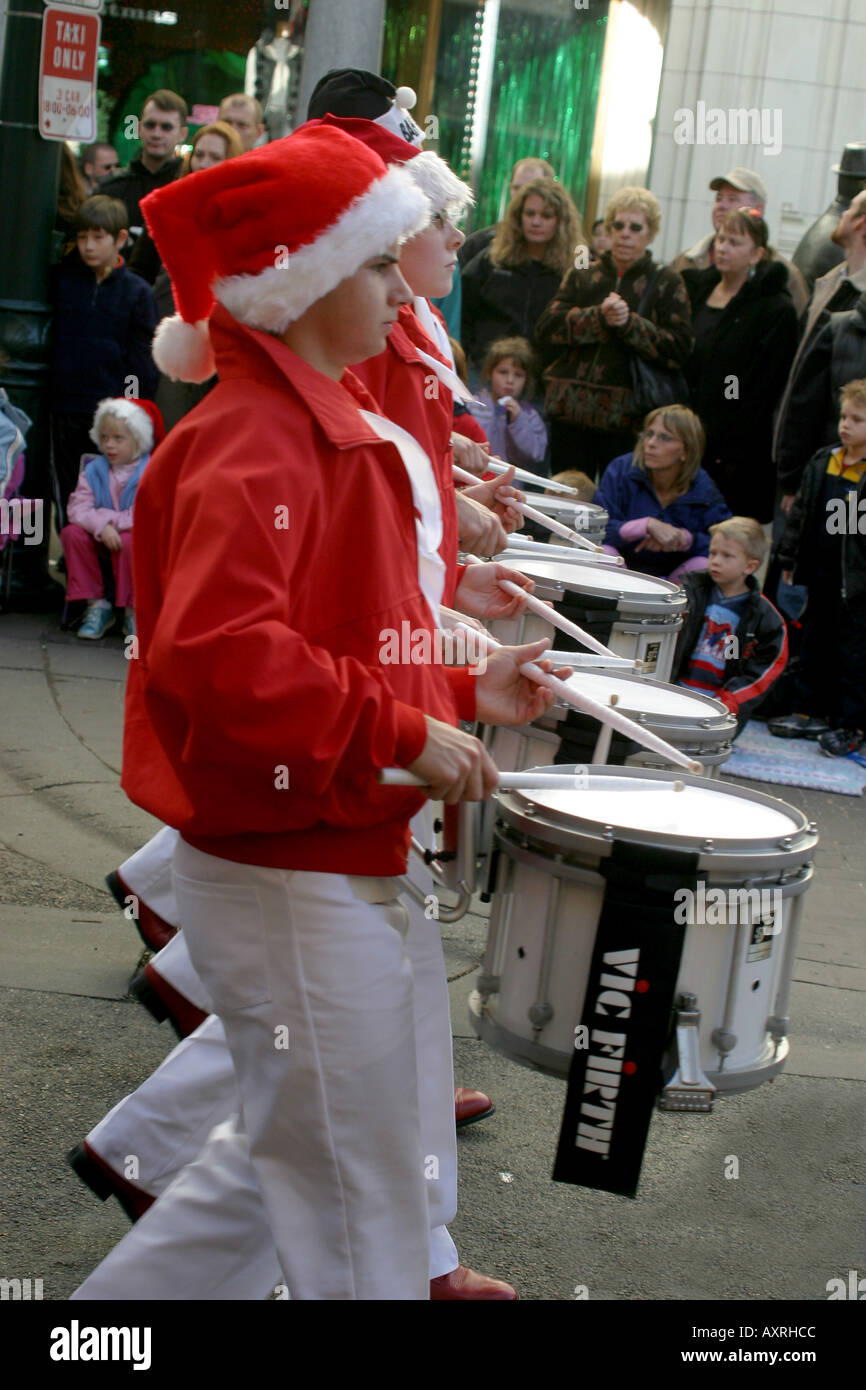 A band playing and marching in the Santa Claus parade Stock Photo - Alamy