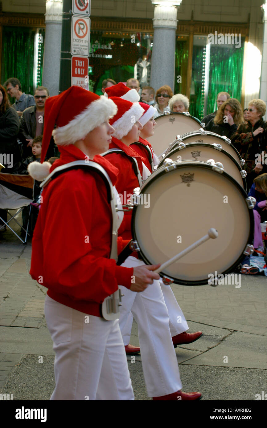 A band playing and marching in the Santa Claus parade Stock Photo - Alamy