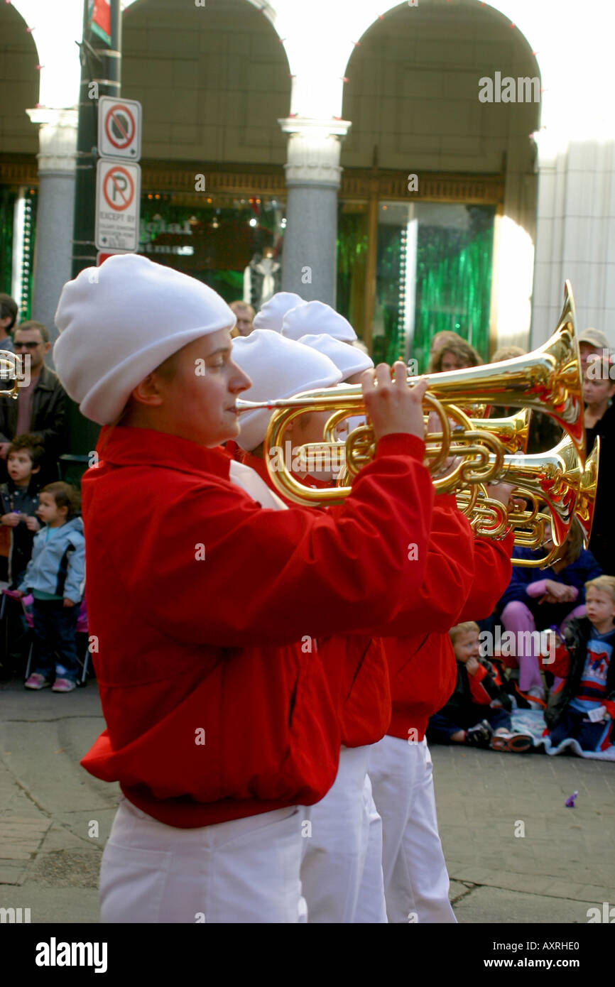 A band playing and marching in the Santa Claus parade Stock Photo - Alamy