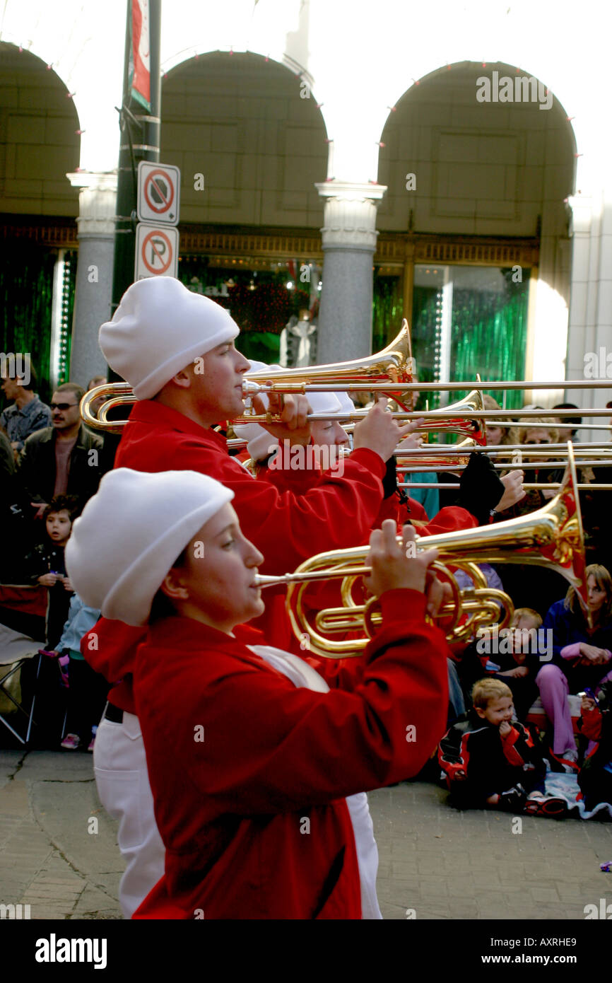 A band playing and marching in the Santa Claus parade Stock Photo - Alamy