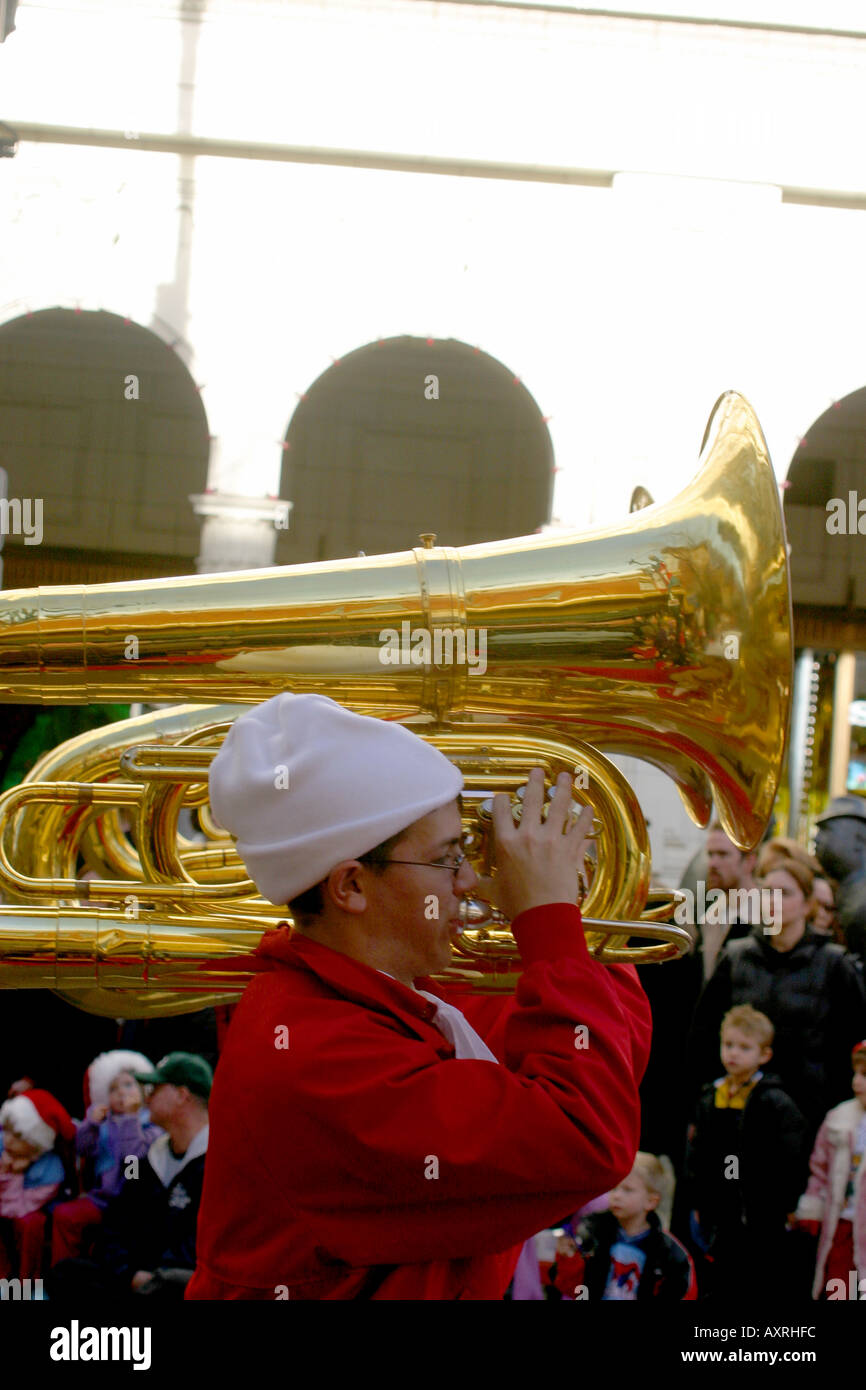 A band playing and marching in the Santa Claus parade Stock Photo - Alamy