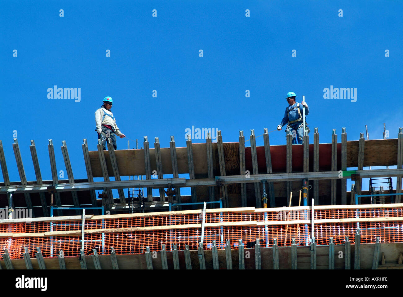 Construction workers building top hi-res stock photography and images ...
