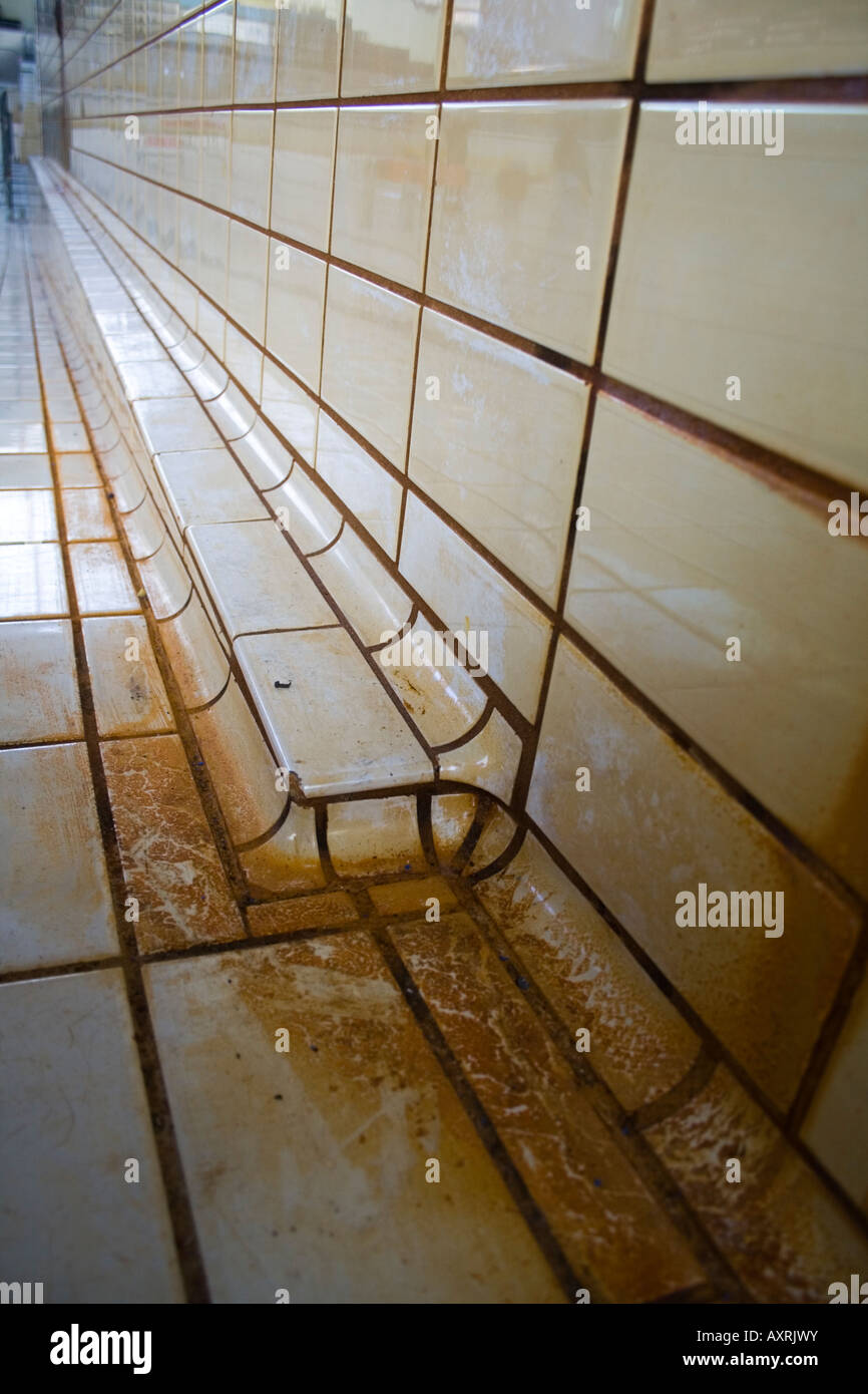 Stained tiles in the former Leeds International Pool showing converging ...