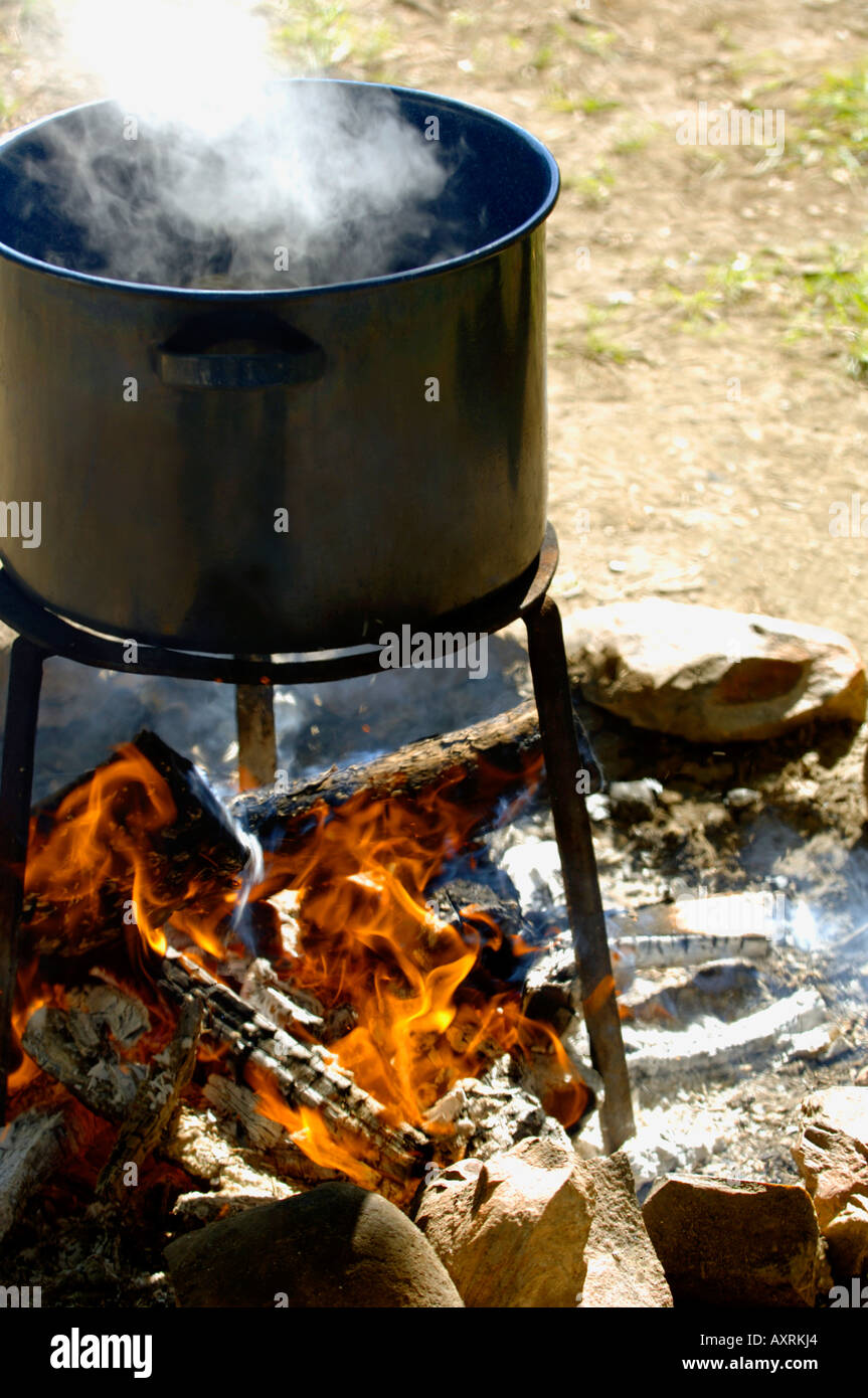 Pot on an open fire Stock Photo - Alamy