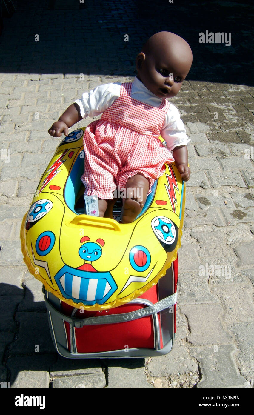 black doll in toy car Stock Photo - Alamy