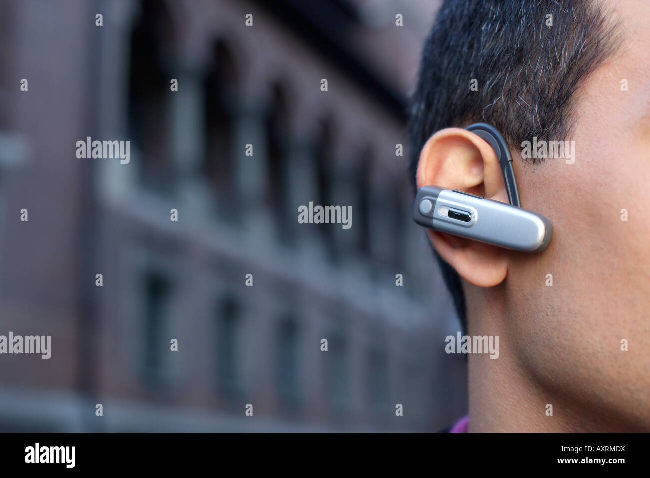 Businessman using a headset Stock Photo - Alamy