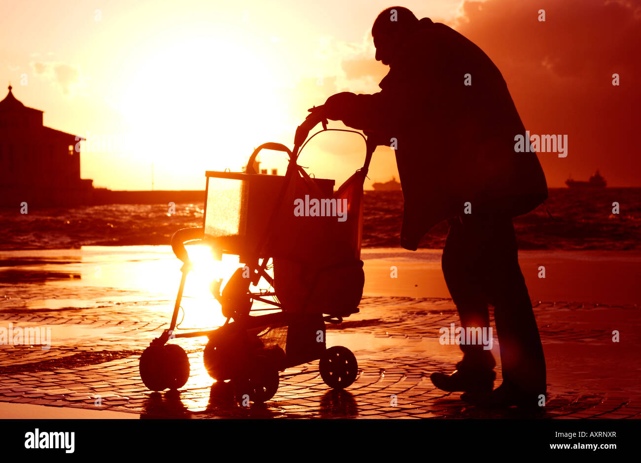 Shadow pushing trolley hi-res stock photography and images - Alamy