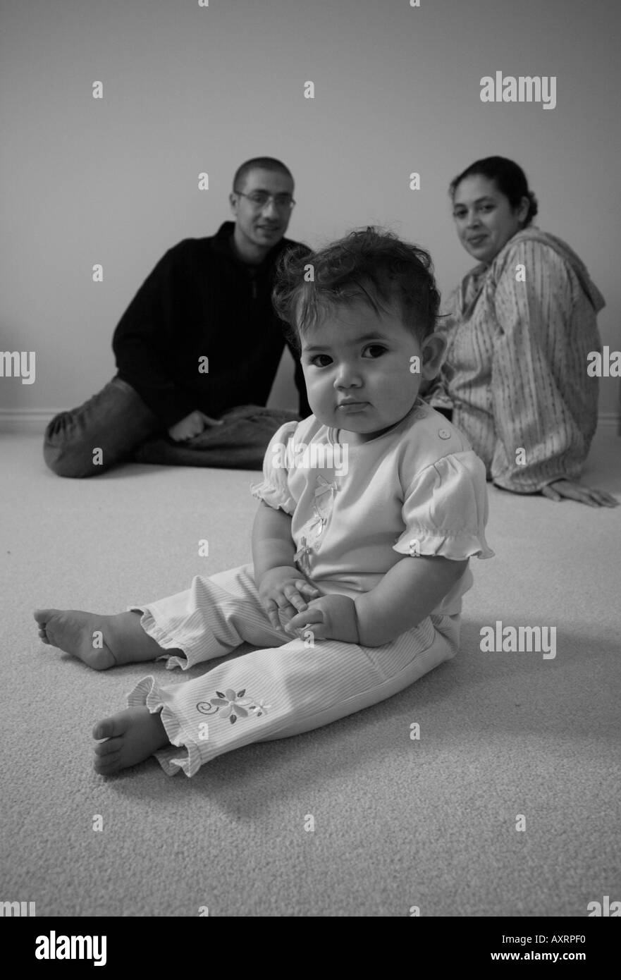 Morrocan family in England in an arranged marriage, sitting in ...