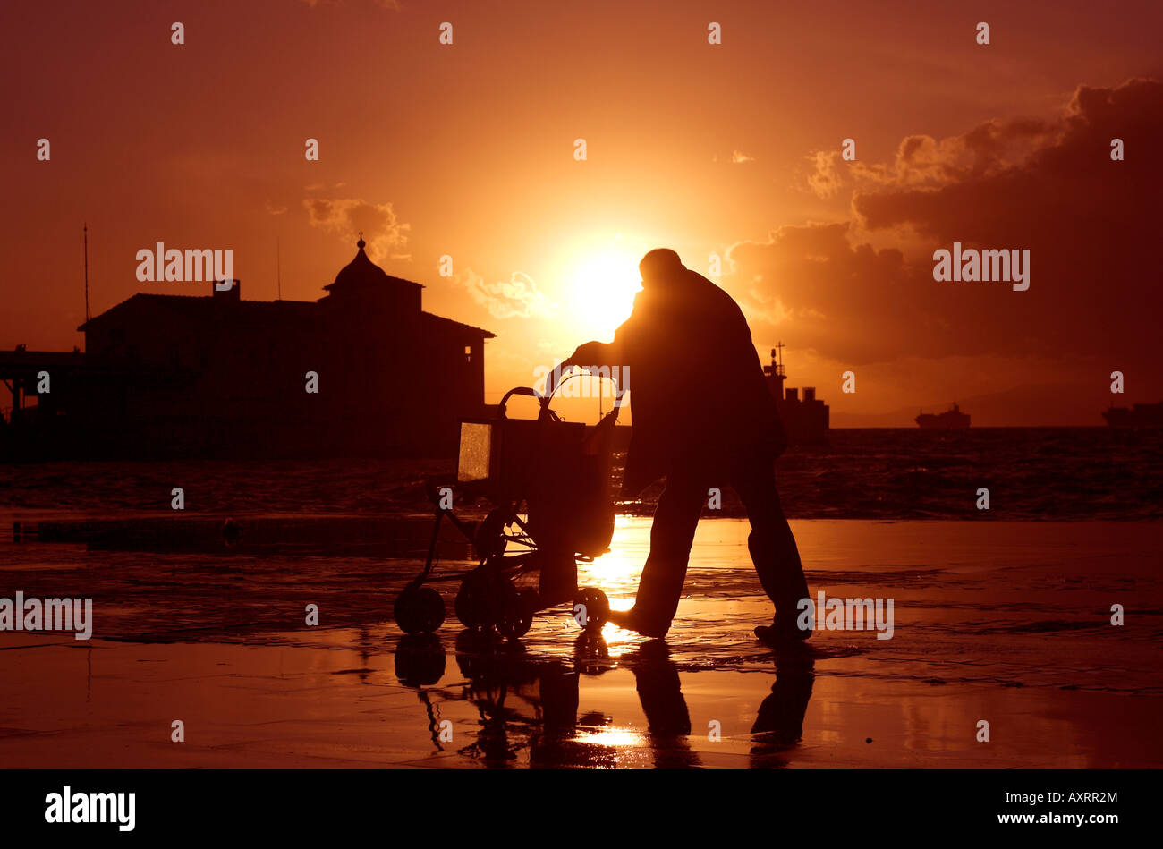 Shadow pushing trolley hi-res stock photography and images - Alamy