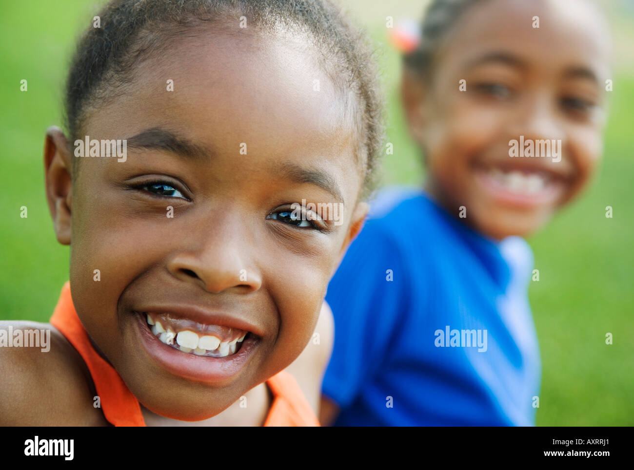 Two girls smiling Stock Photo - Alamy