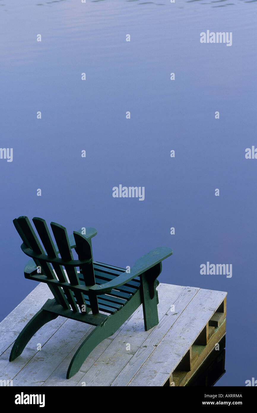 Adirondack chair on boat dock, Geier Lake, Nova Scotia, Canada Stock ...
