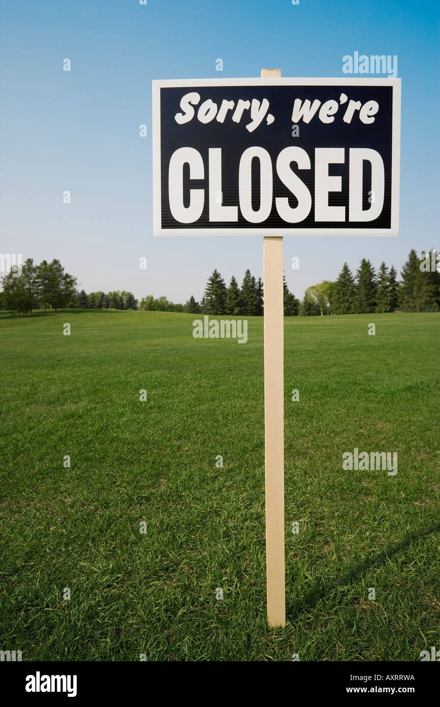 Closed sign in open field Stock Photo - Alamy