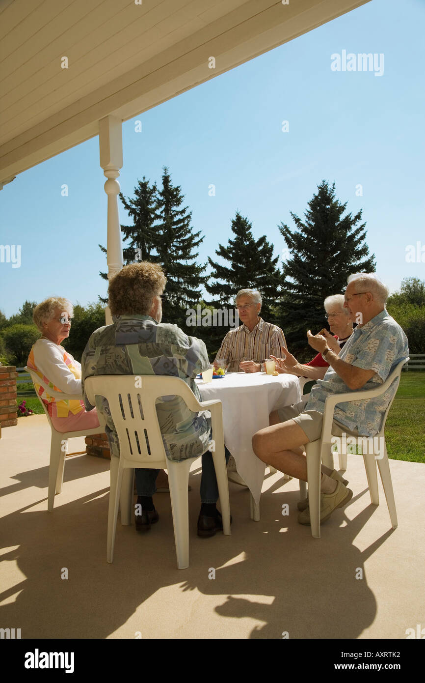Aged senior men friends sit hi-res stock photography and images - Alamy