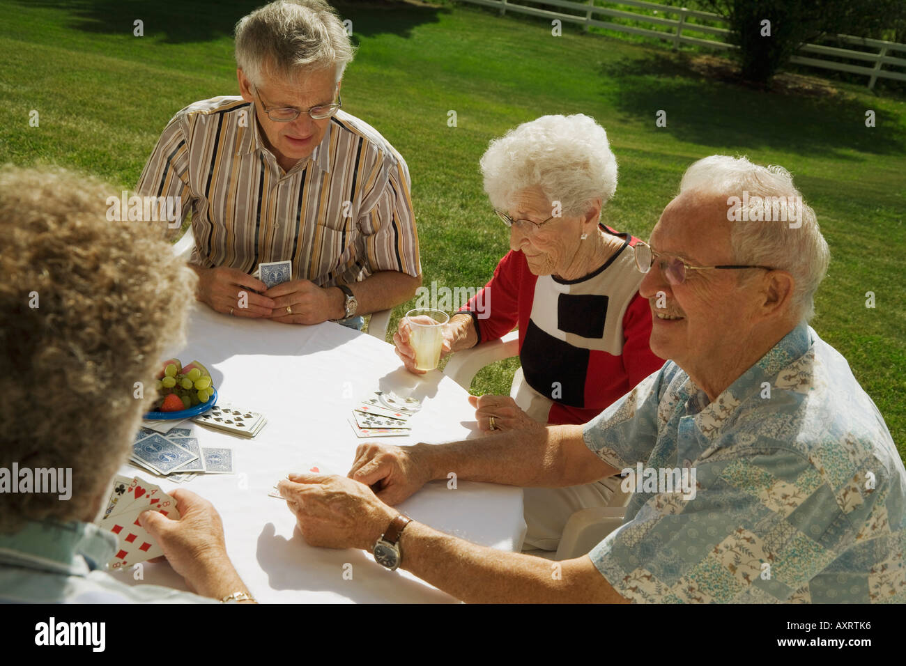 People playing cards Stock Photo - Alamy