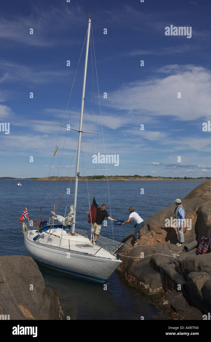People embarking from a small cruiser yacht Oslofjord Norway Stock ...