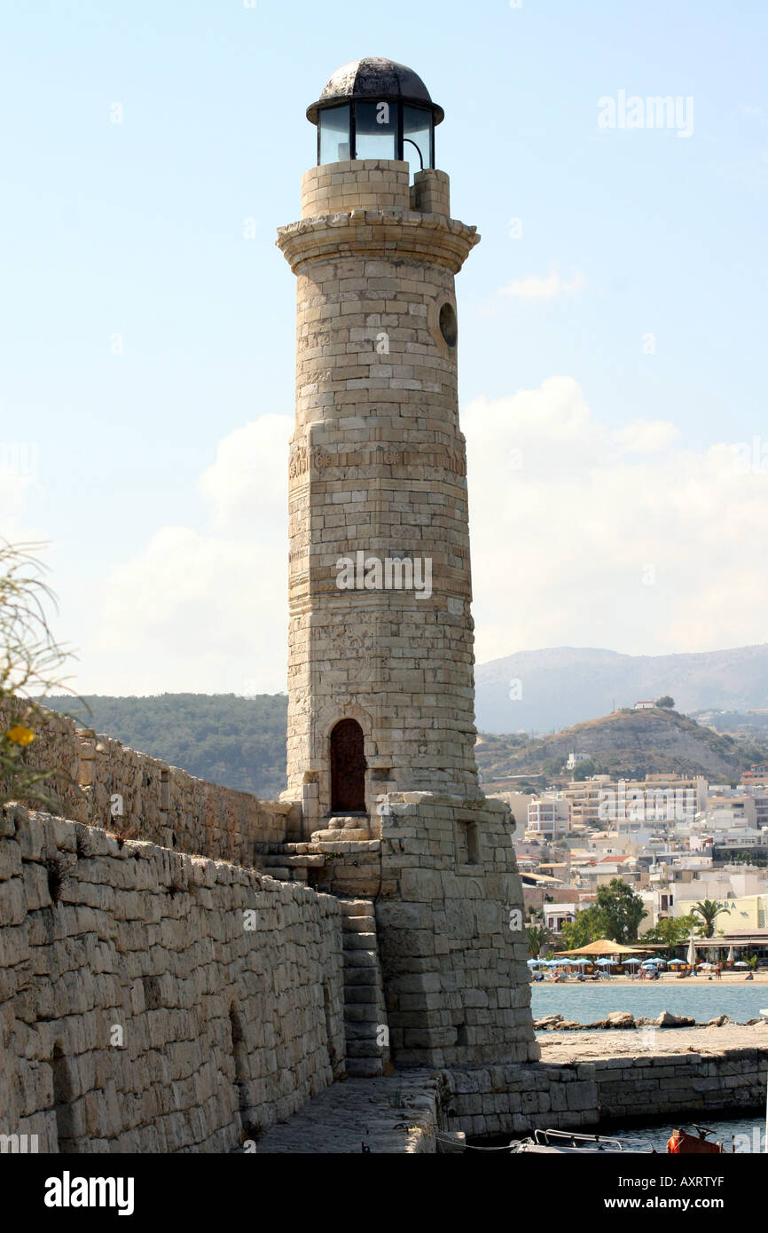 THE OLD LIGHTHOUSE IN THE HARBOUR OF RETHYMNON ON THE GREEK ISLAND OF ...