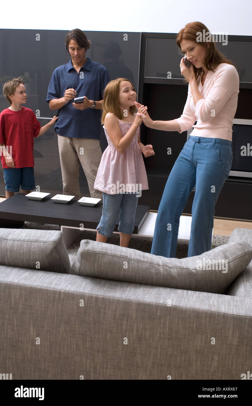 Kids bothering parents hi-res stock photography and images - Alamy