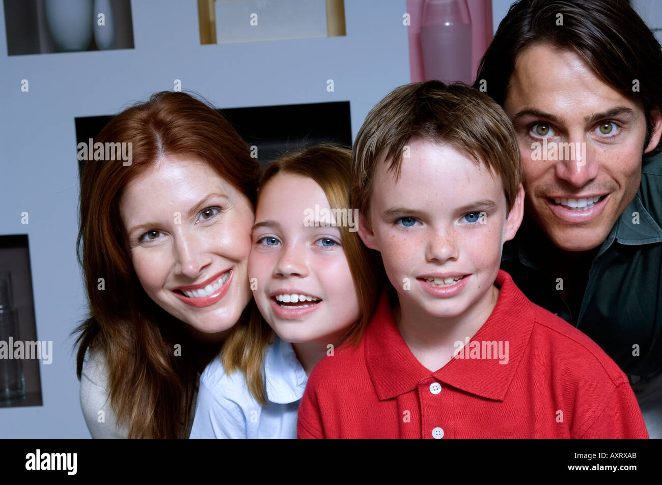 Portrait of two parents and two children Stock Photo - Alamy