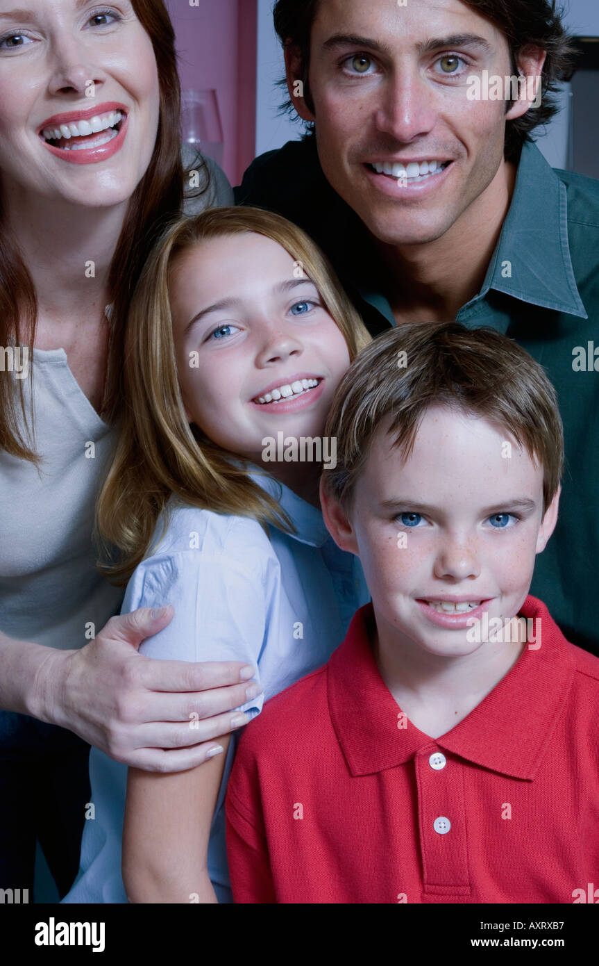 Portrait of two parents and two children Stock Photo - Alamy
