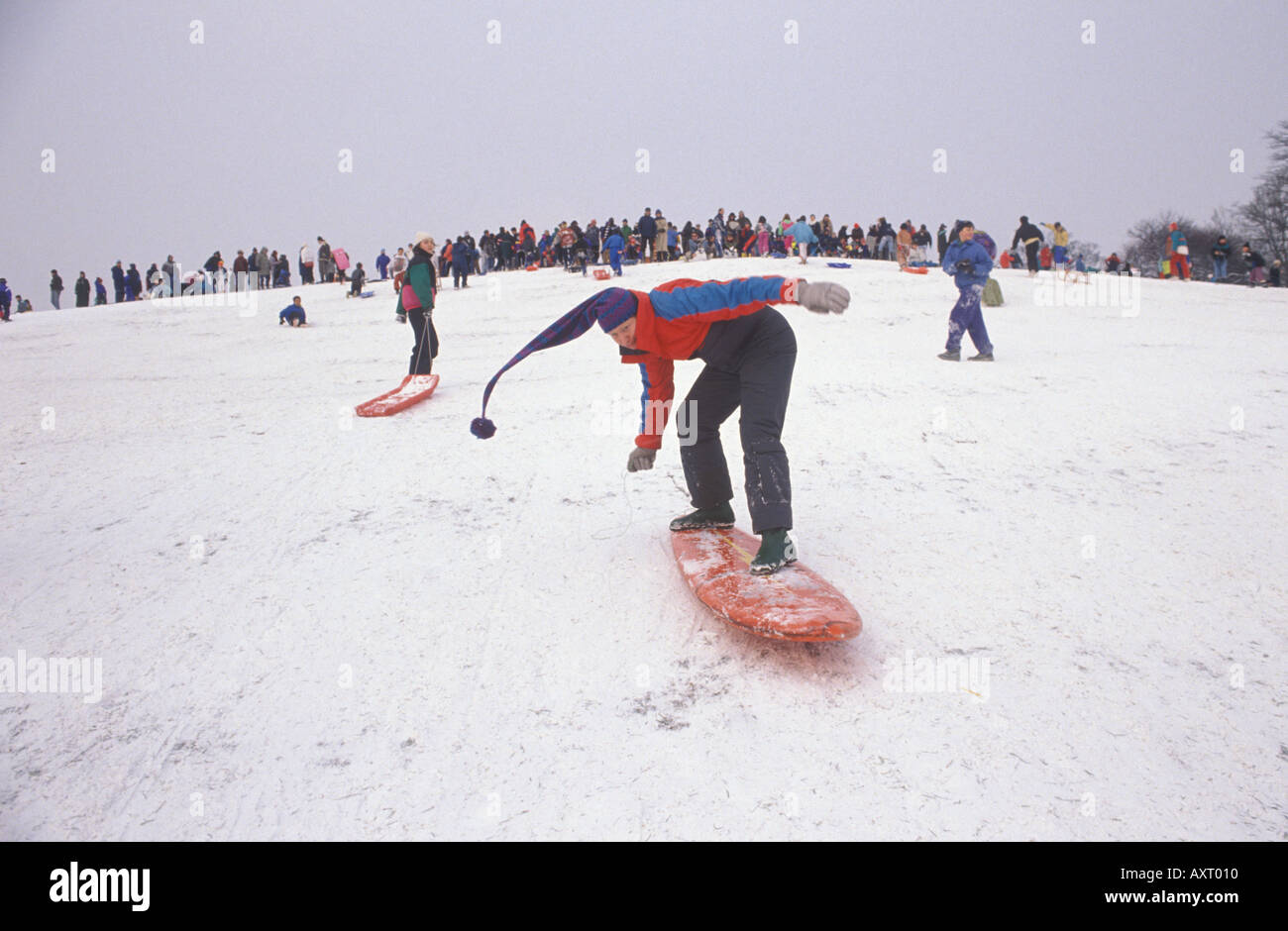 Snow UK 1990s young people enjoying a white winter Primrose Hill London ...
