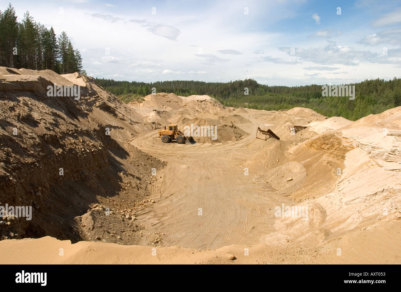 View of a gravel pit in sandy ridge , glacial esker at sand quarrying ...