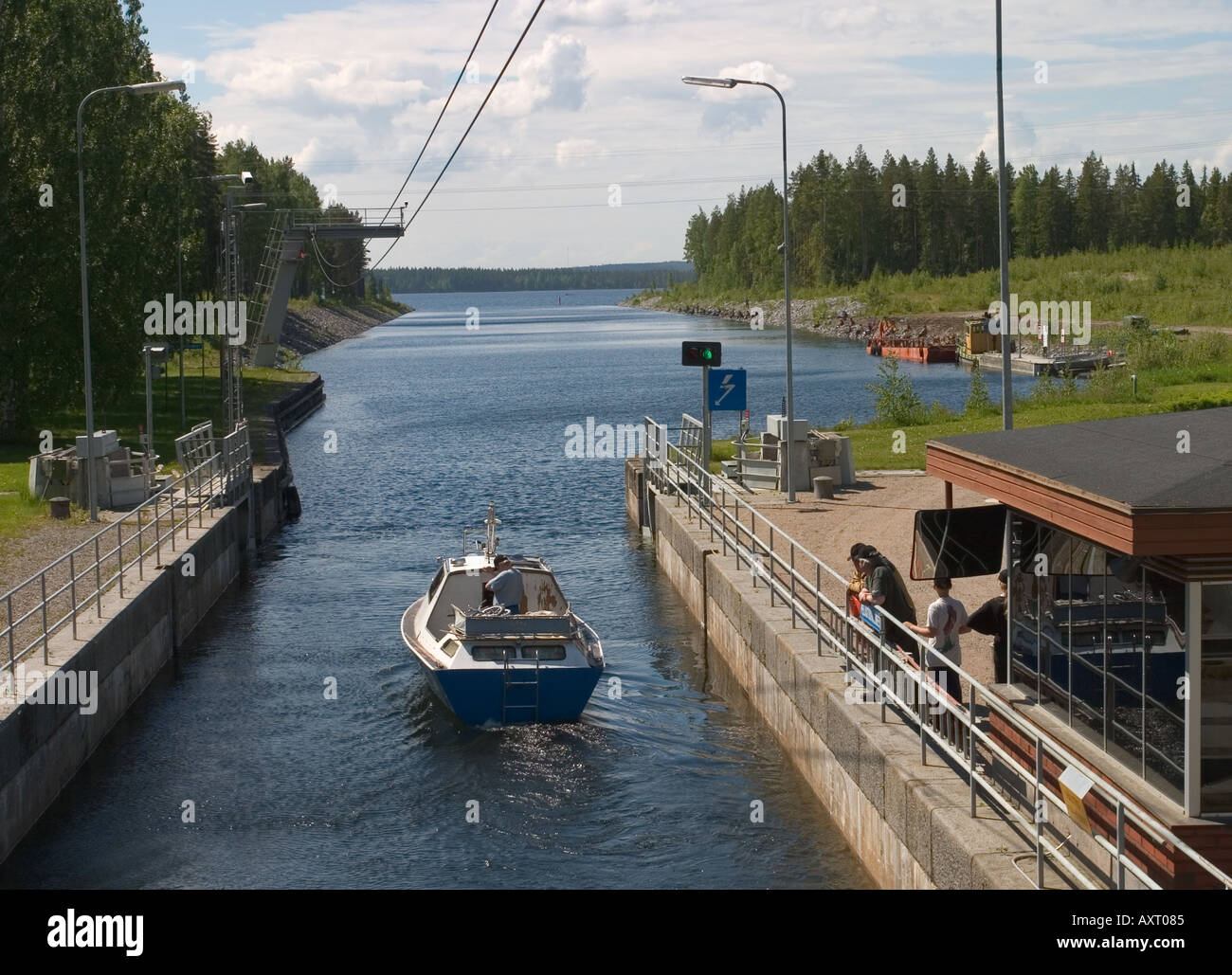 Boat at Neituri canal lock floodgates open boat leaving the lock ...
