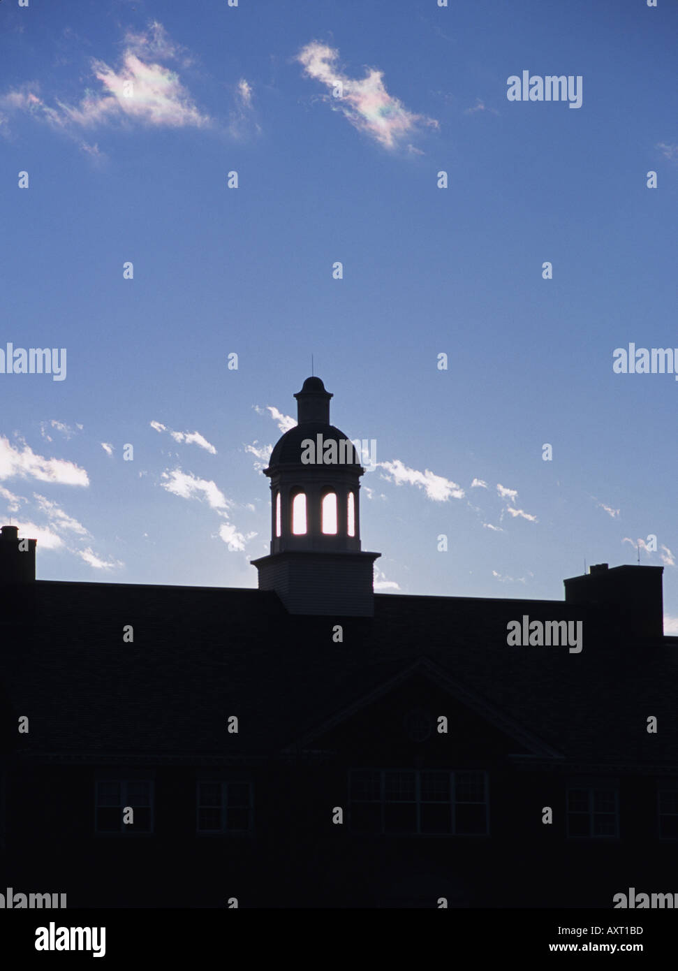 building and cupola with blue sky and clouds Stock Photo - Alamy