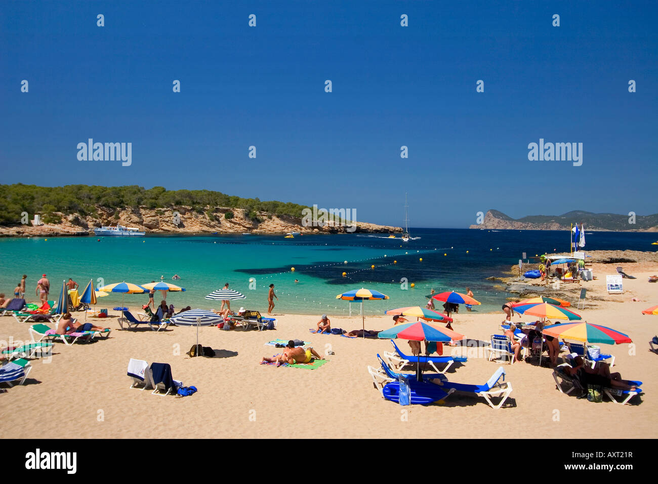 Spanien Balearen Ibiza beach Cala Bassa beach people sunbathing Stock ...