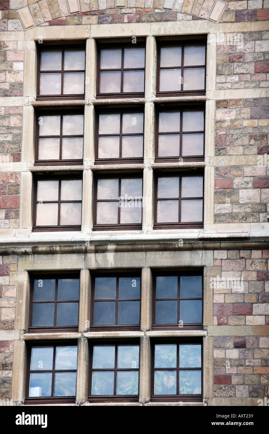 colorful windows set into block wall Stock Photo - Alamy