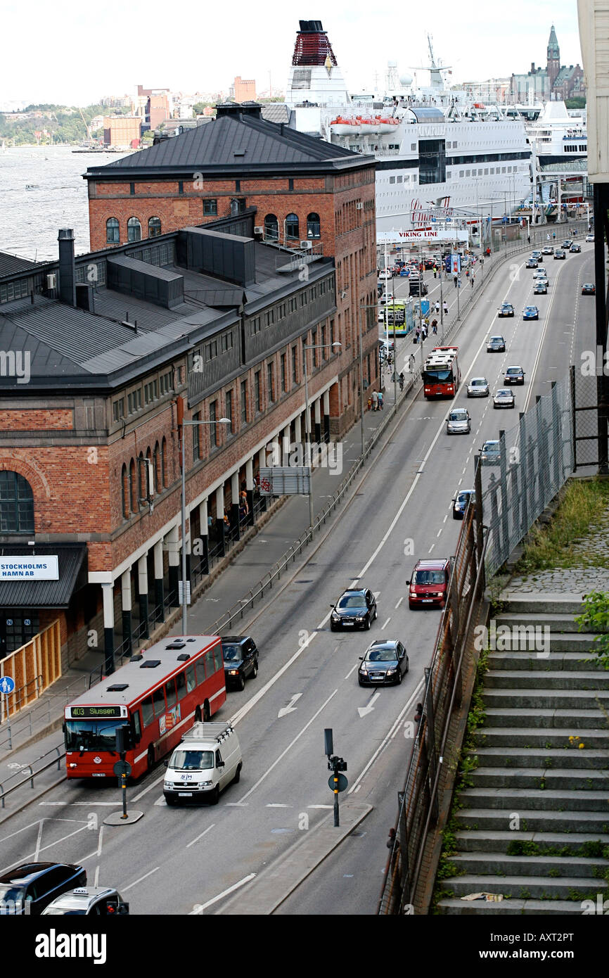 Street scene of buildings next to waterfront Stock Photo - Alamy