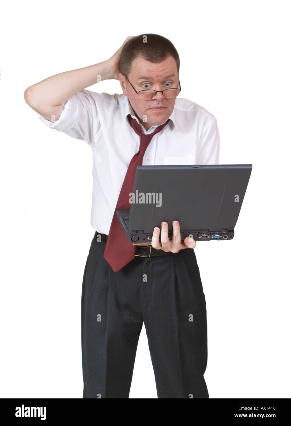 Computer Failure - A business man shows his frustration with his laptop ...