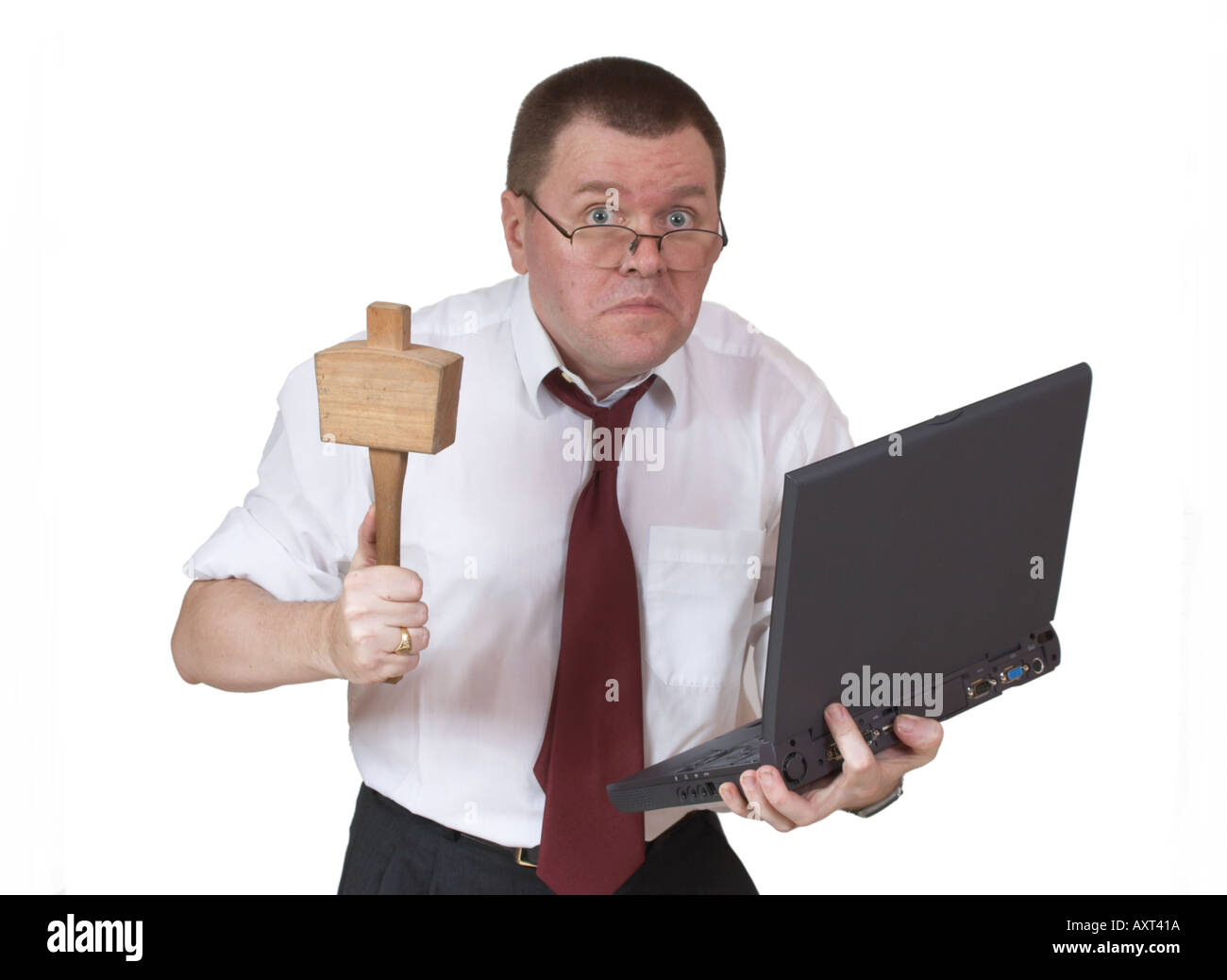 Computer Failure - A business man shows his anger with his laptop ...