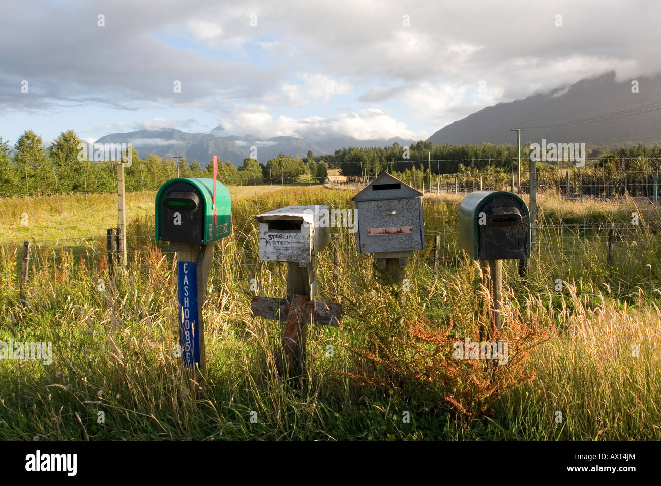 Four Post Boxes Stock Photo - Alamy