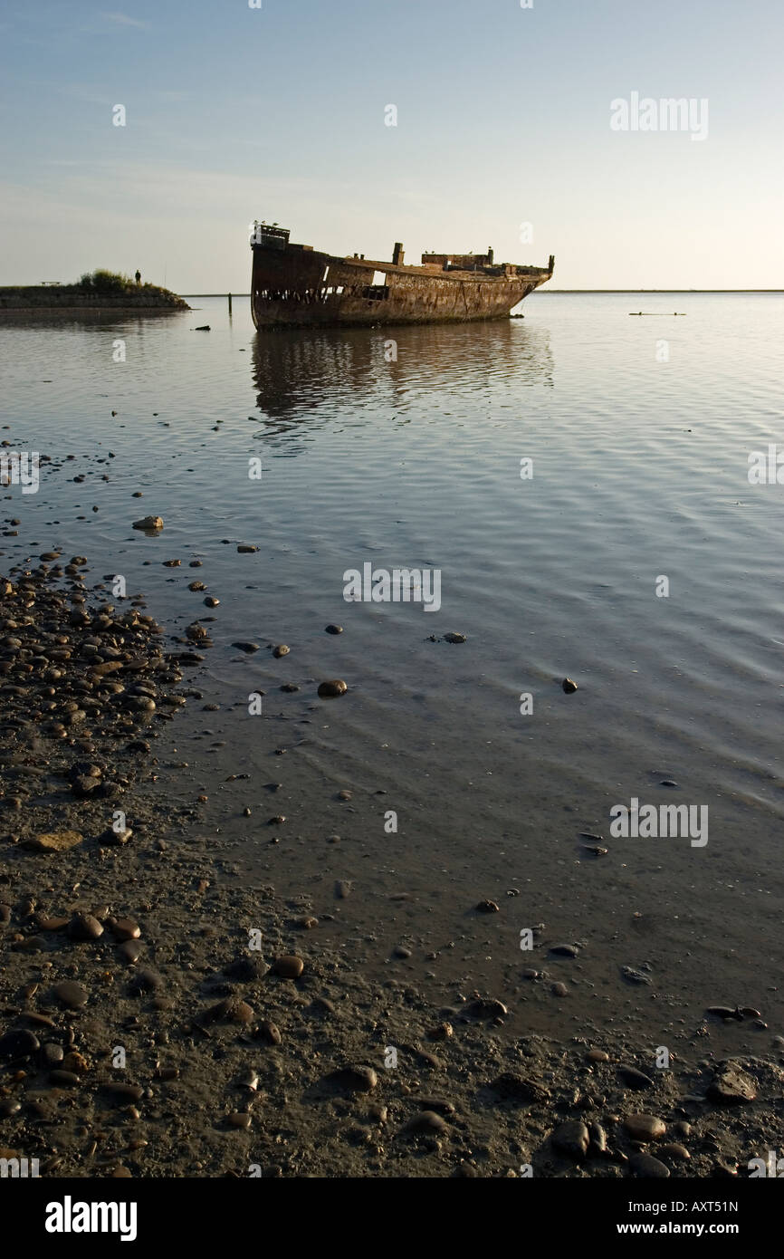 Ship Wreck Left Deserted on Beach Stock Photo - Alamy