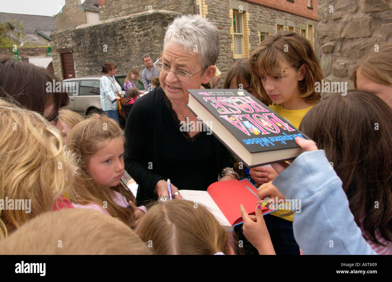 Childrens author Jacqueline Wilson surrounded by a group of children ...