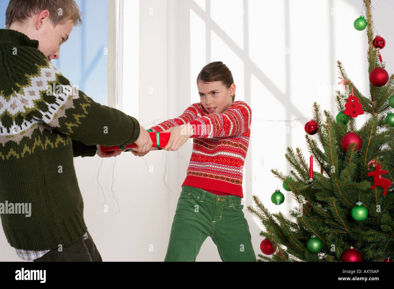 Child present fighting hi-res stock photography and images - Alamy