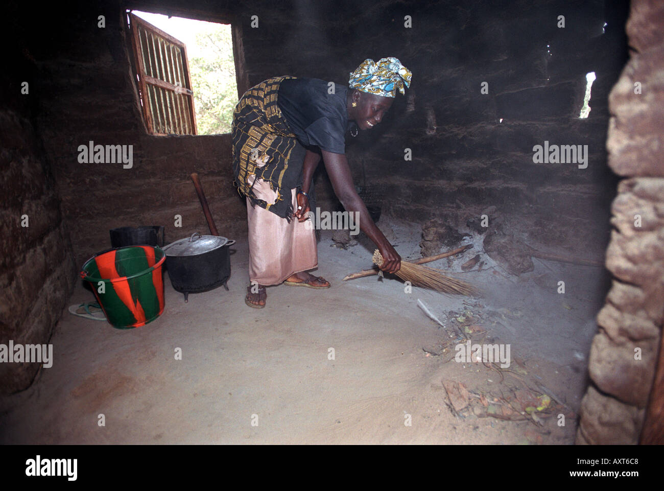 An African woman cleaning her house in The Gambia West Africa Stock ...